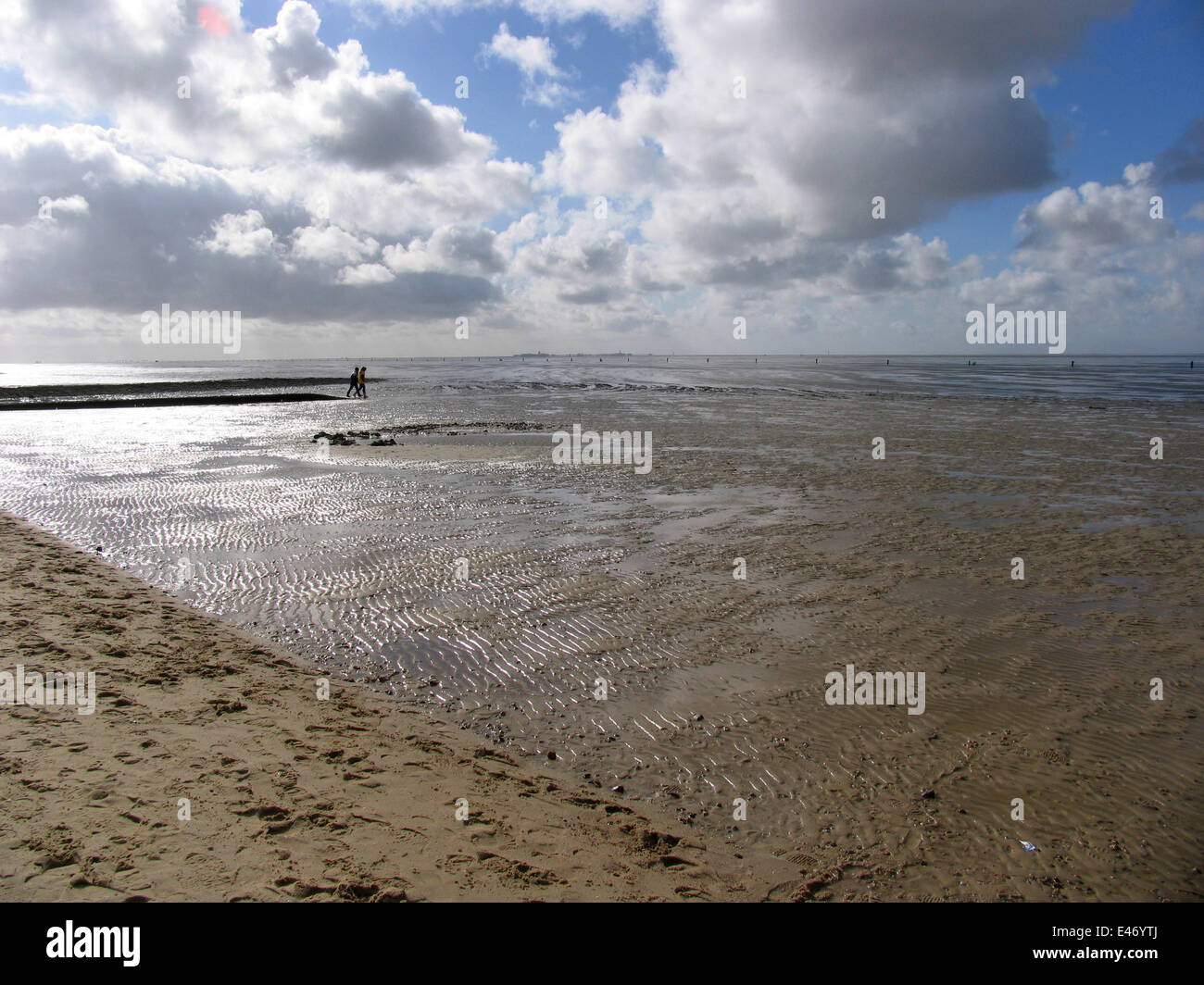 Watt-hiking without a guide during Ebb at the beach of Duhnen. With ebb ...