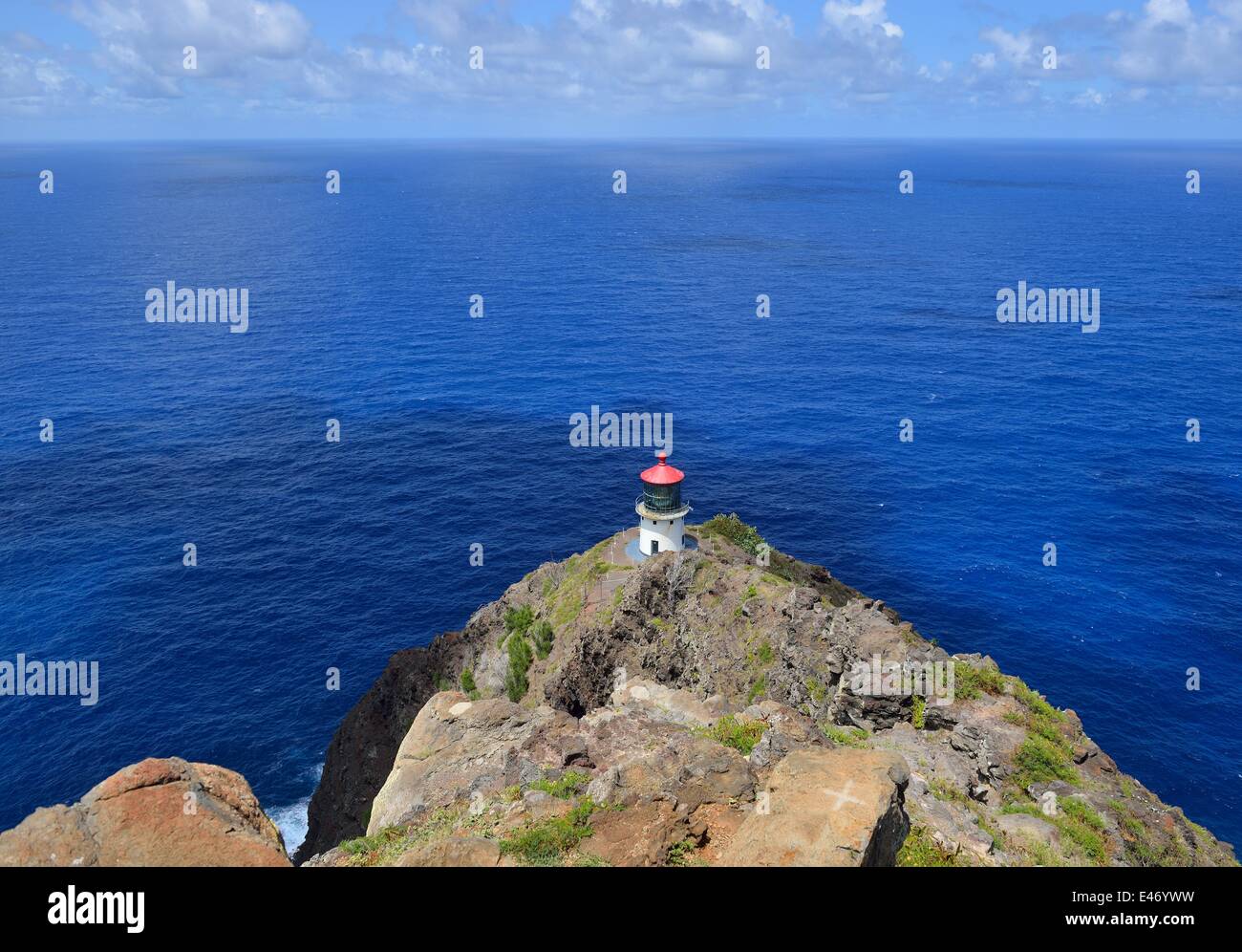 A lighthouse stands on a rock at the Makapuu Beach Park near Honolulu ...