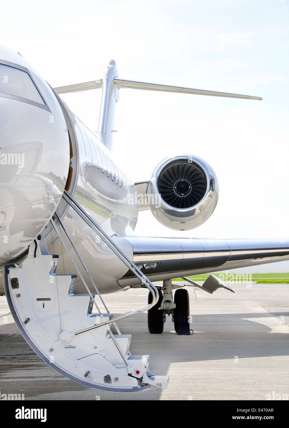 Stairs with Jet Engine on a modern private jet airplane - Bombardier ...