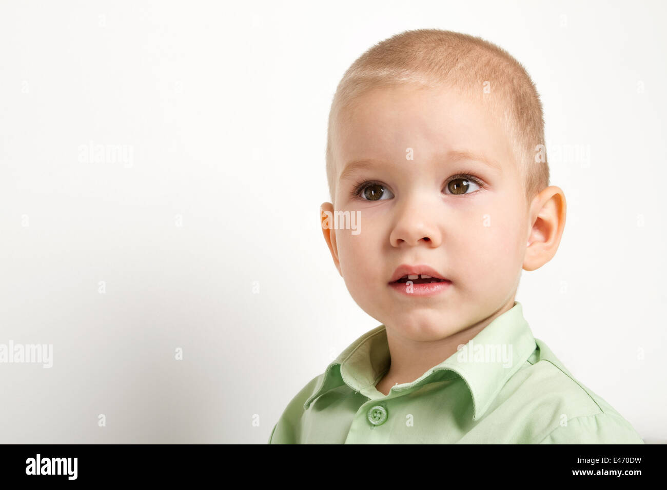 Head portrait of kid on light background Stock Photo - Alamy
