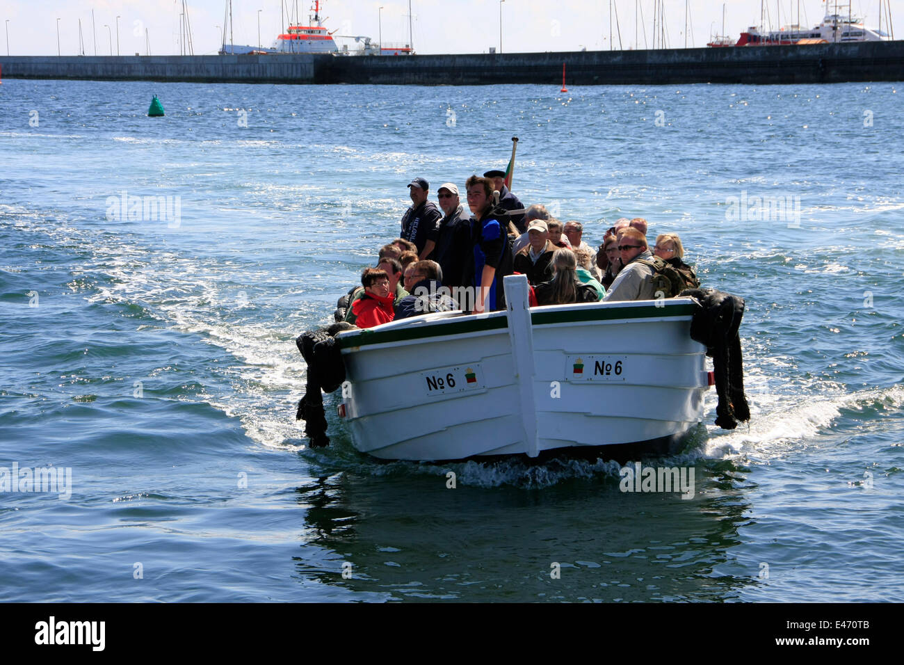 Disembark with boats on Helgoland. The Helgoland passenger boats are ...
