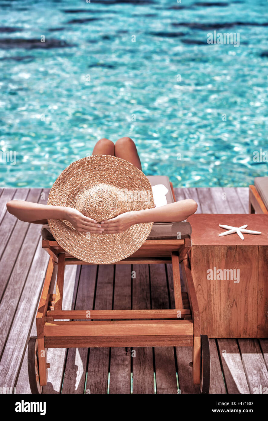 Luxury female tanning on beach High Resolution Stock Photography and ...