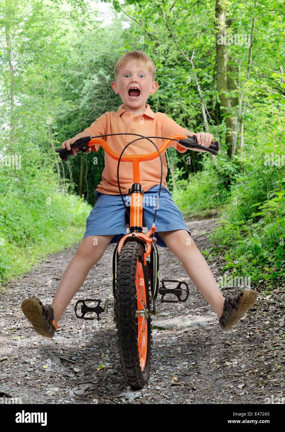 young boy about to crash with a scared look on his face, isolated on a ...