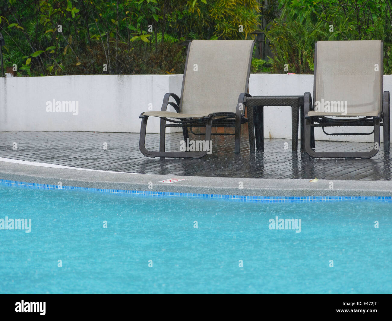 Heavy rain swimming pool hi-res stock photography and images - Alamy