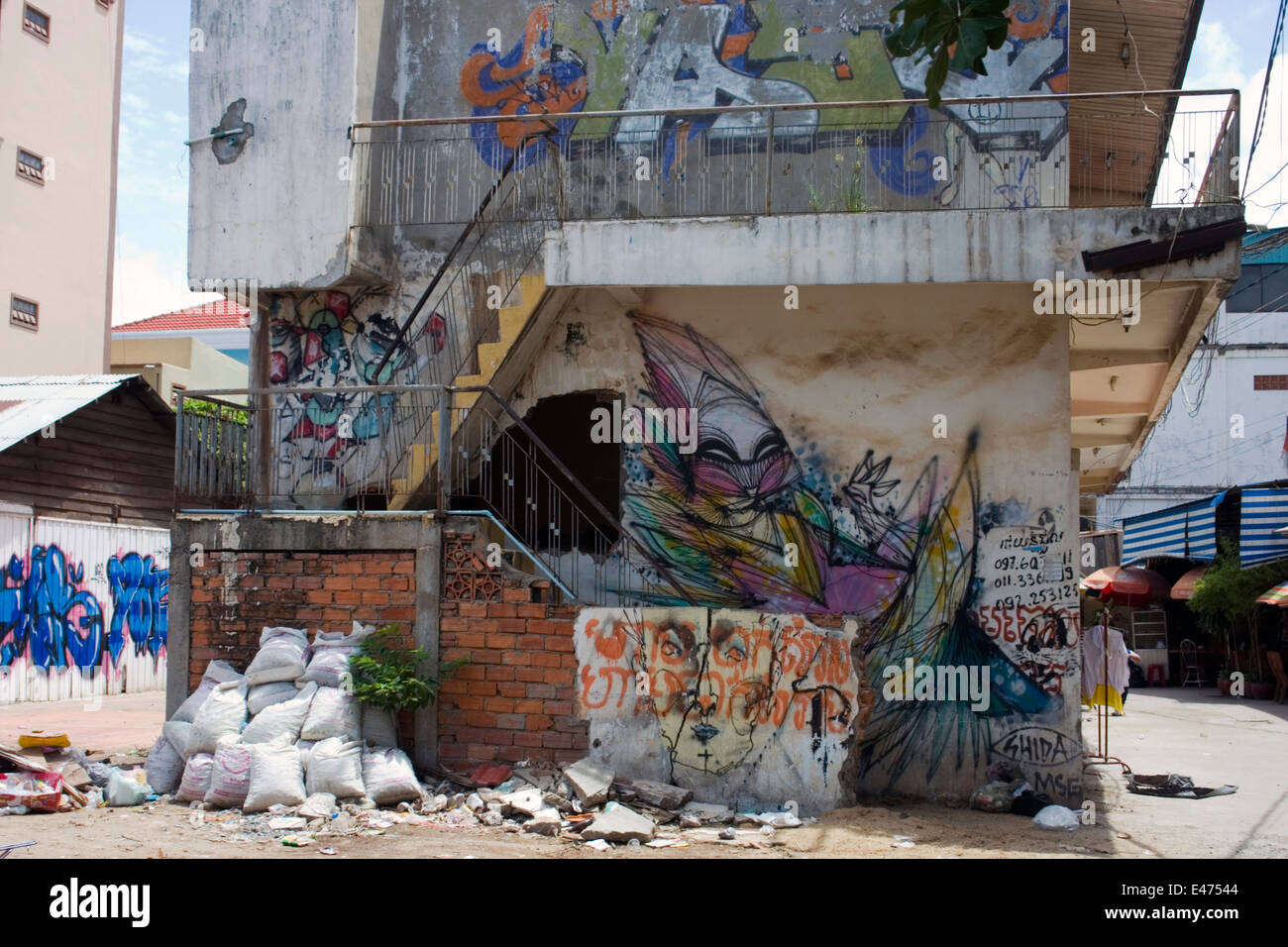 A wall painted with graffiti in an eviction zone is part of the urban ...