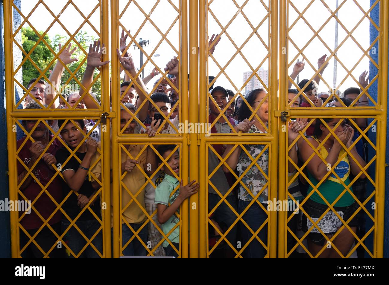 Fortaleza, Brazil. 3rd July, 2014. Fans of Brazil stand outside the ...