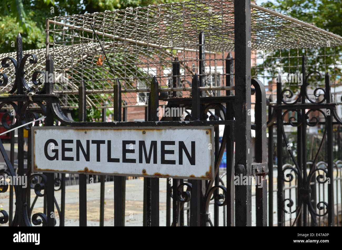 Gentlemen public toilet sign Stock Photo - Alamy