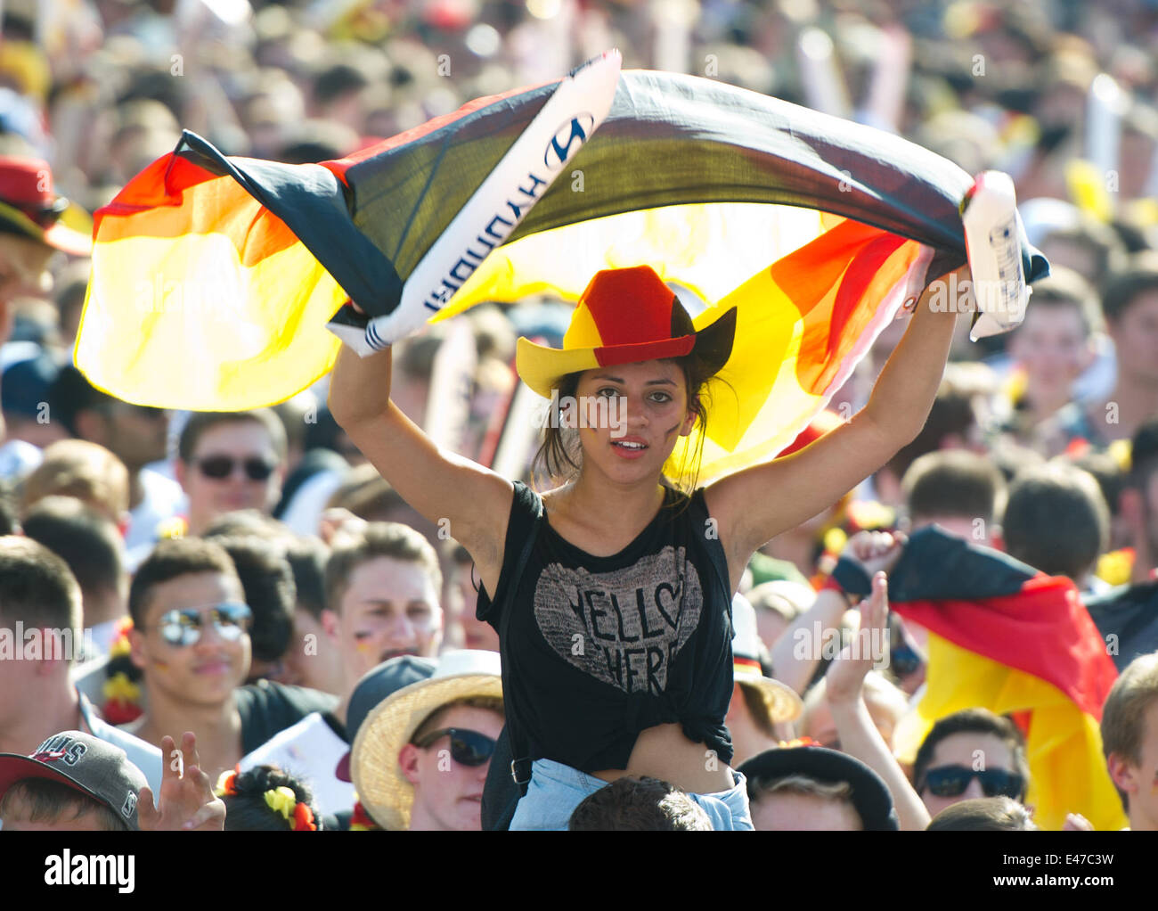 Berlin, Germany. 04th July, 2014. A soccer fan is pictured while she ...