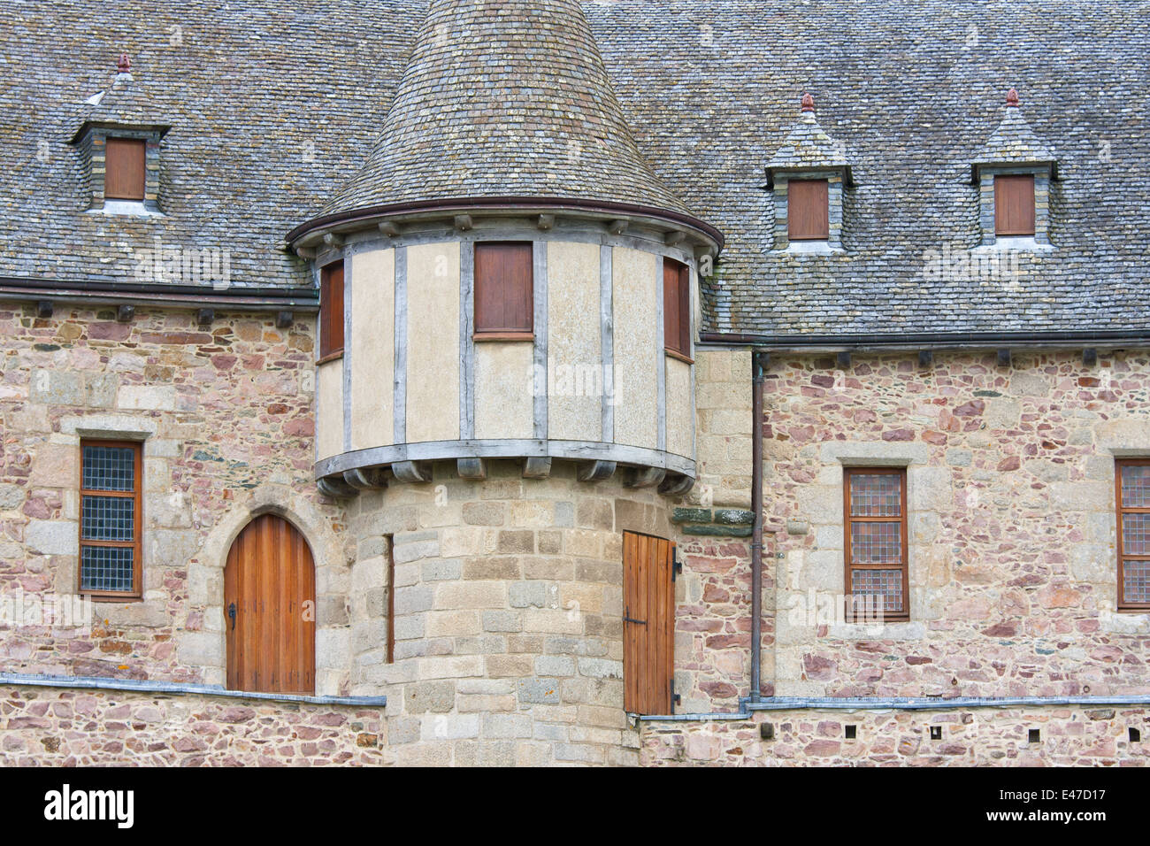 Facade of a medieval castle with corner tower Stock Photo - Alamy