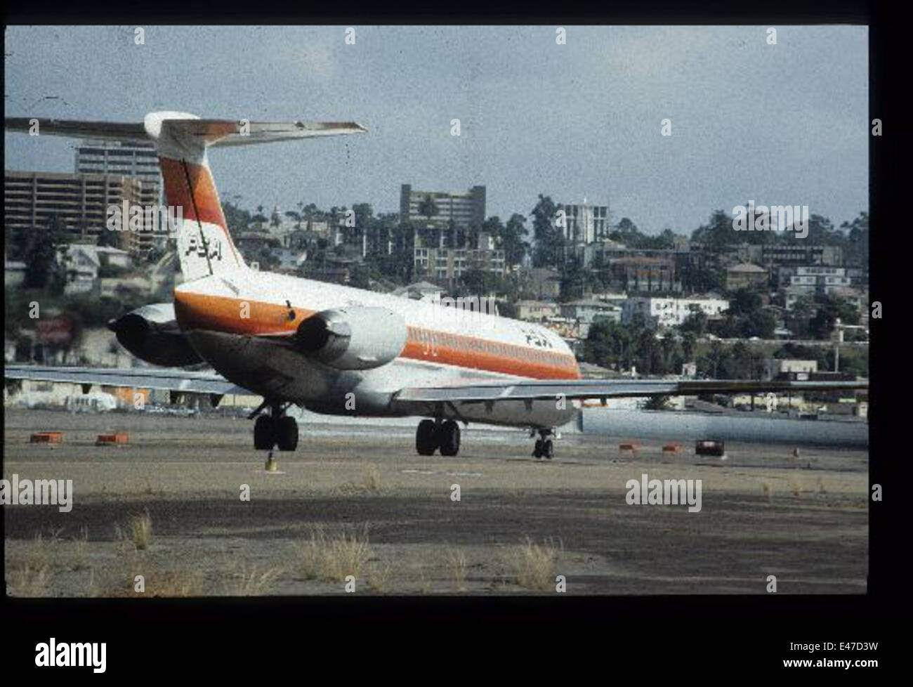 This photograph features a Pacific Southwest Airlines (PSA) flight ...
