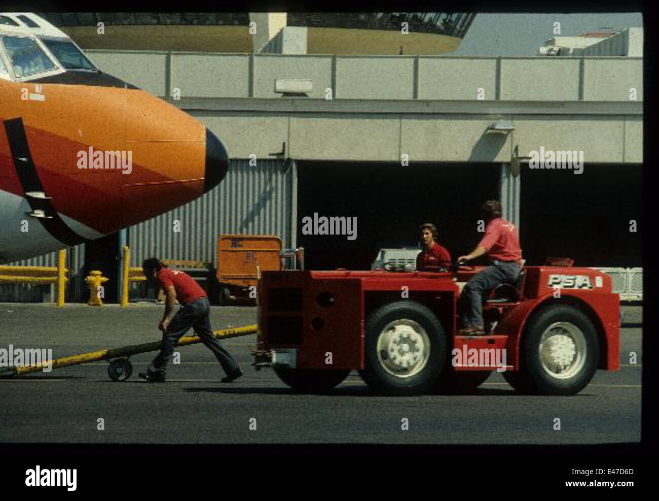 The 07.05.A-0003 photograph depicts a flight attendant from Pacific ...