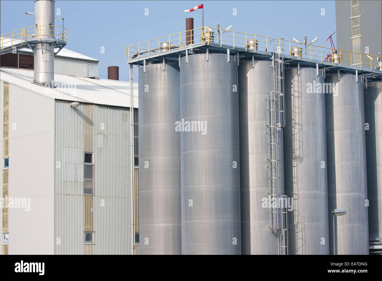 Many big silo's of a Dutch factory Stock Photo - Alamy