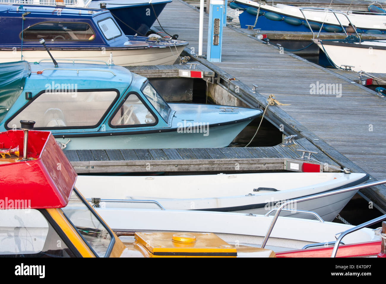Motorboats in a Dutch harbor Stock Photo - Alamy