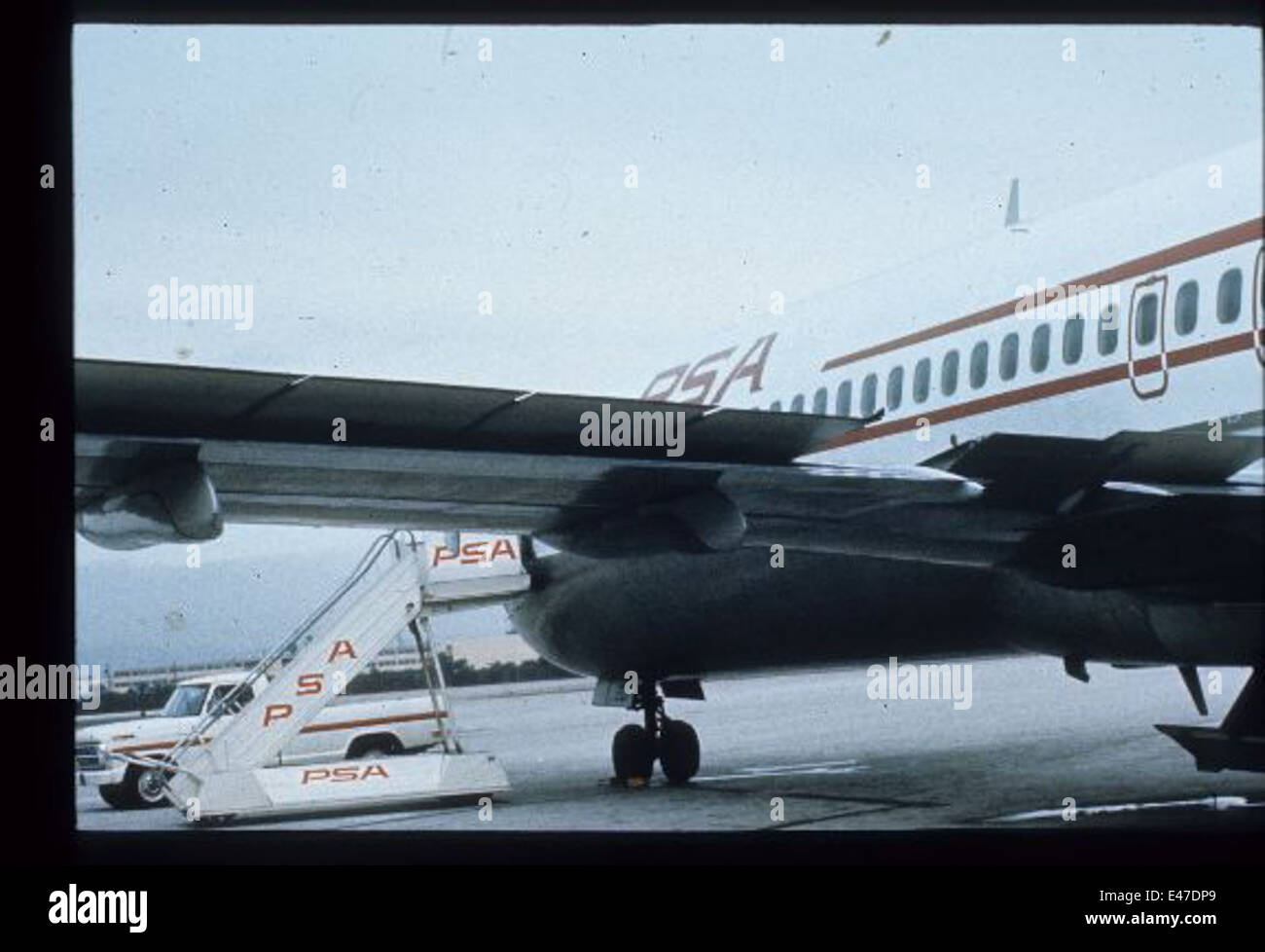 This image features a flight attendant from Pacific Southwest Airlines ...