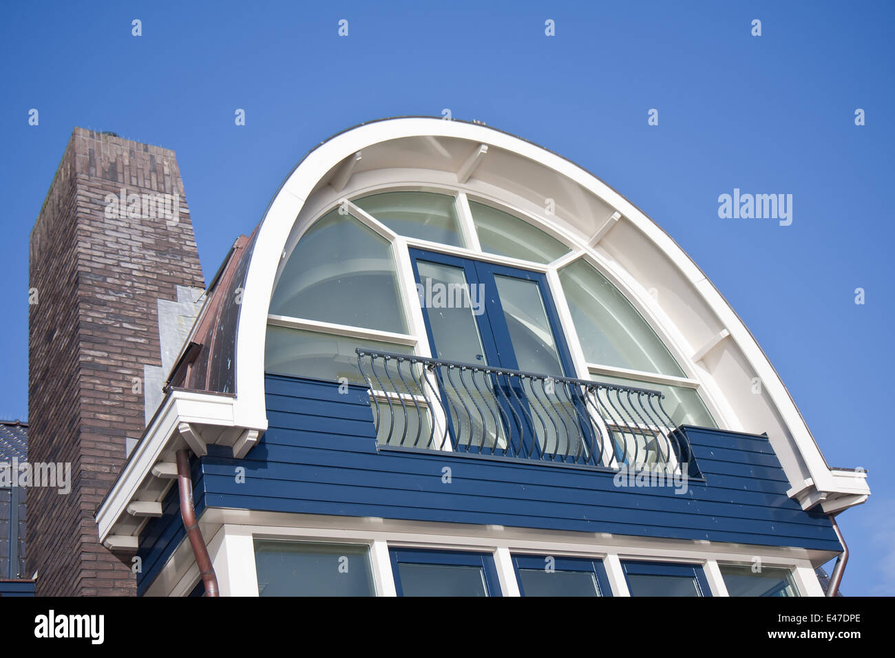 Blue facade of a new modern house Stock Photo - Alamy