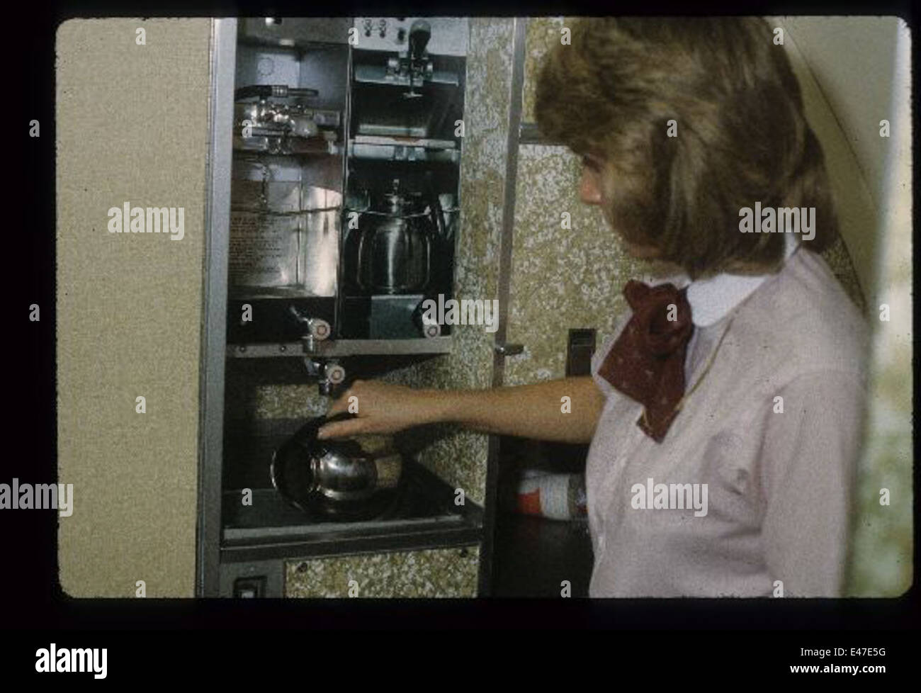 This photograph depicts a flight attendant from Pacific Southwest ...