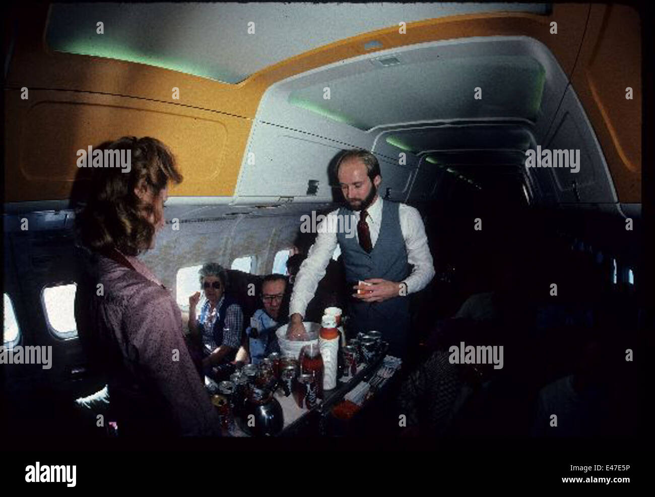 A photograph of a flight attendant aboard Pacific Southwest Airlines ...