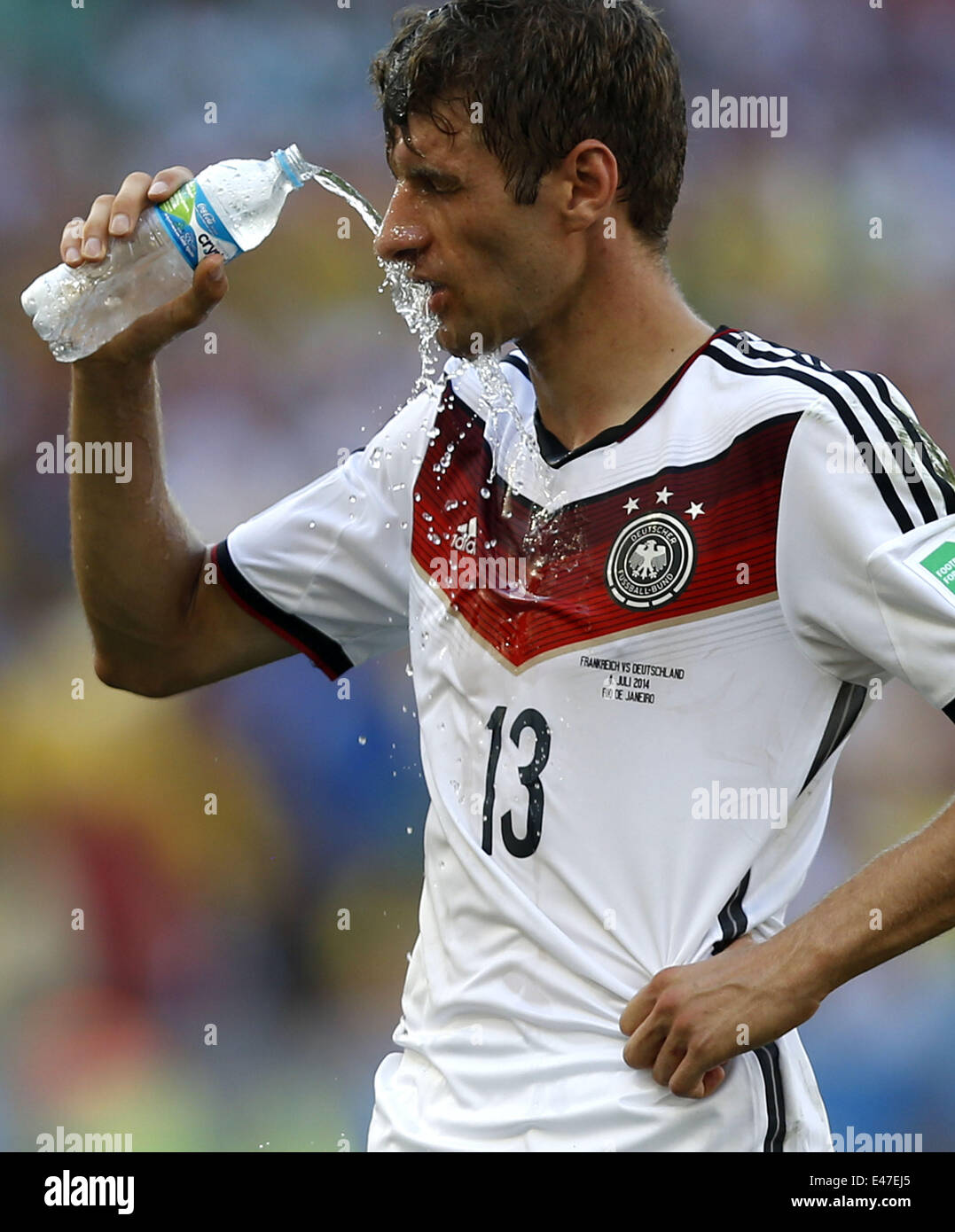 Rio De Janeiro, Brazil. 4th July, 2014. Germany's Thomas Muller cools ...