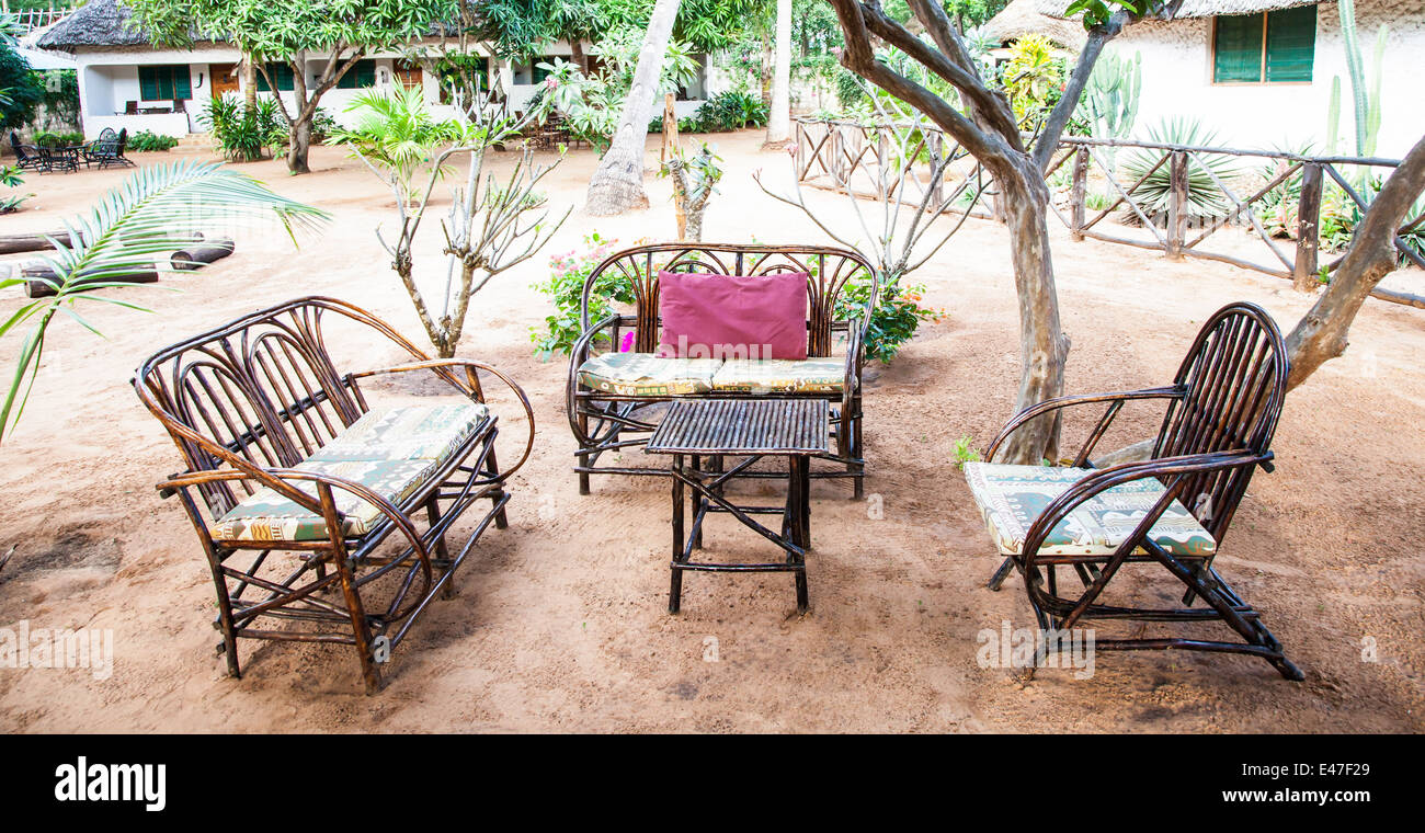 Kenya. Elegant furniture made of wood in an African garden Stock Photo ...