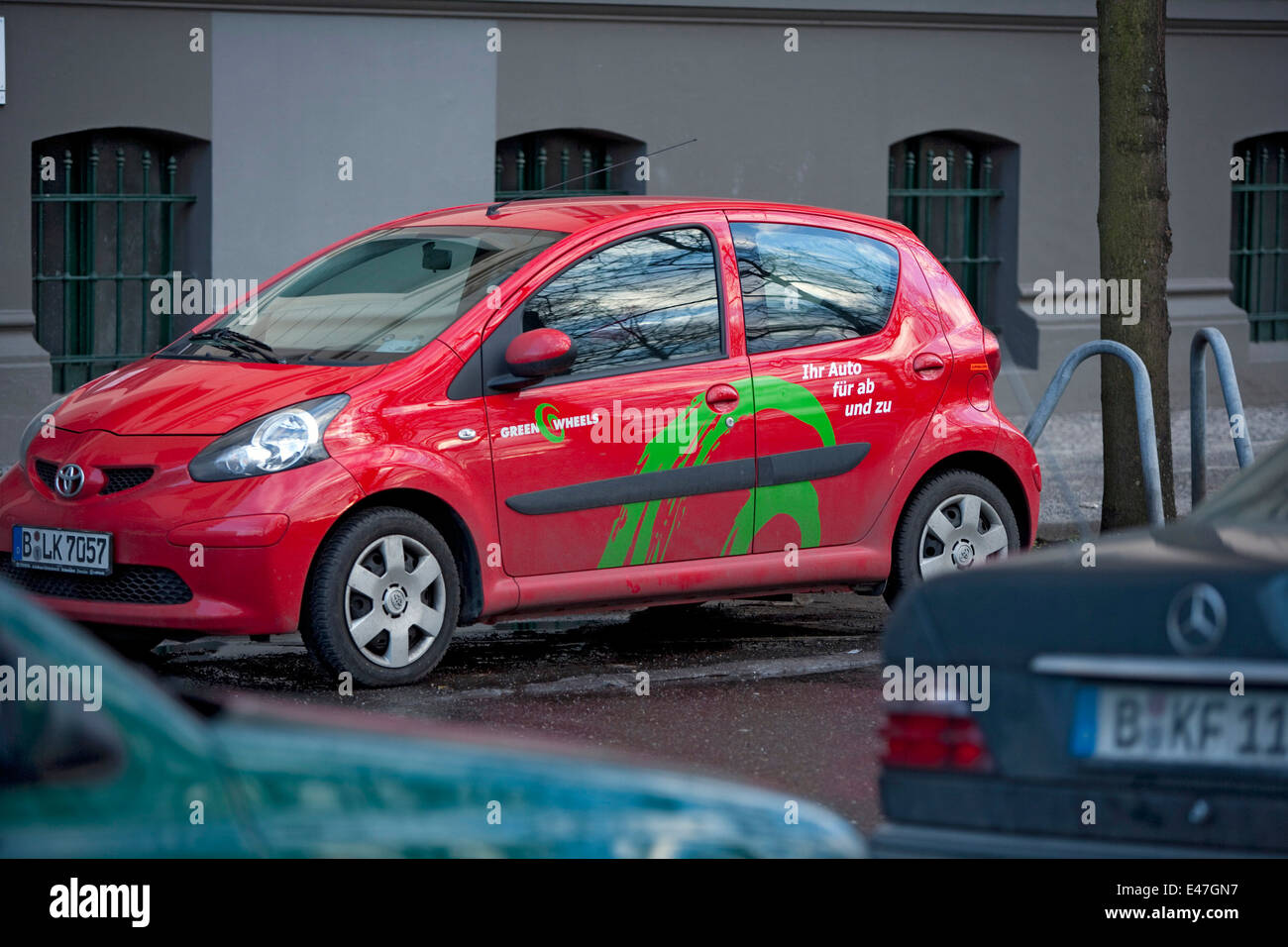 Green Wheels Carsharing Stock Photo - Alamy