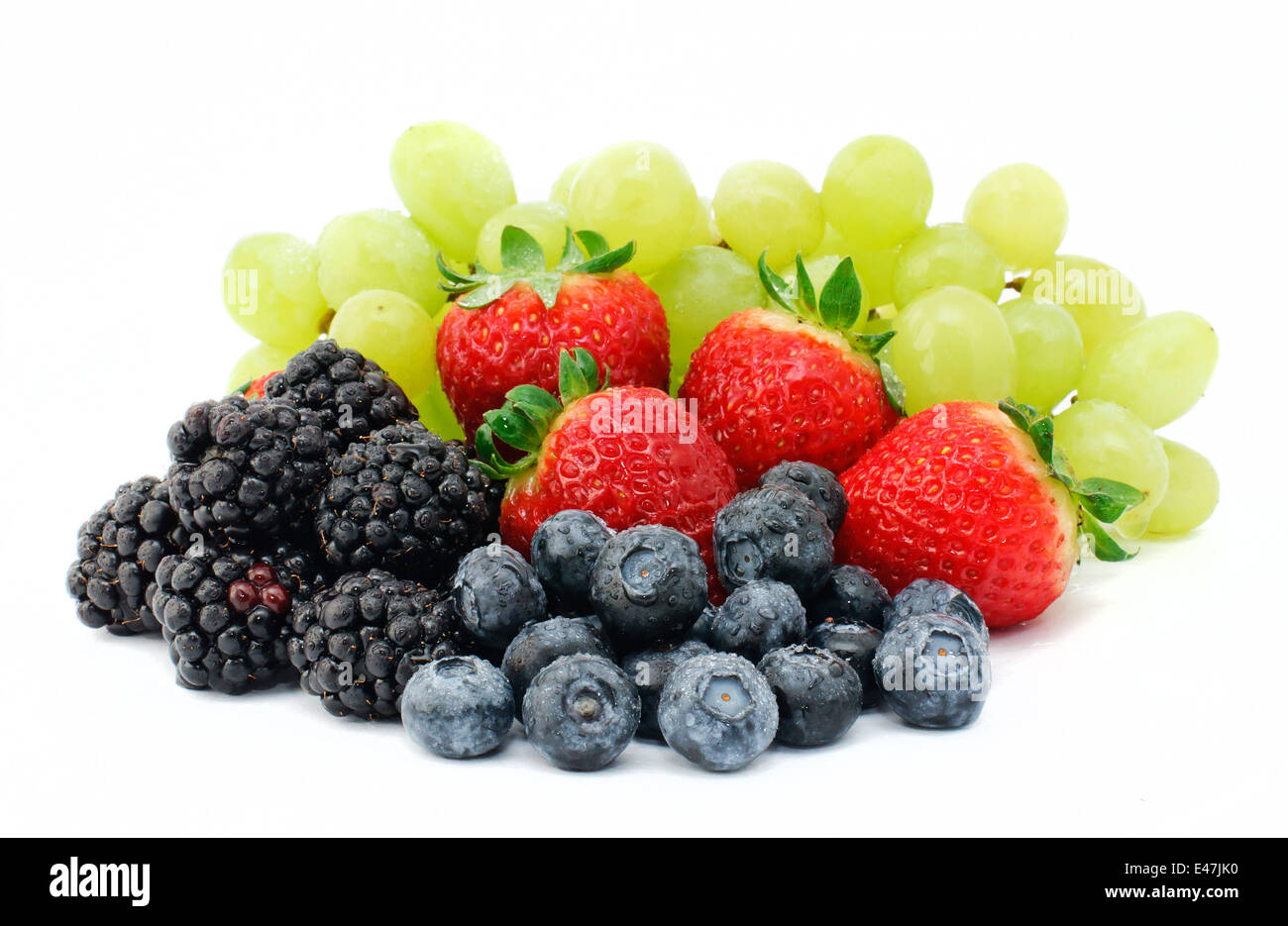 Fresh fruit salad mix on white backgound Stock Photo - Alamy