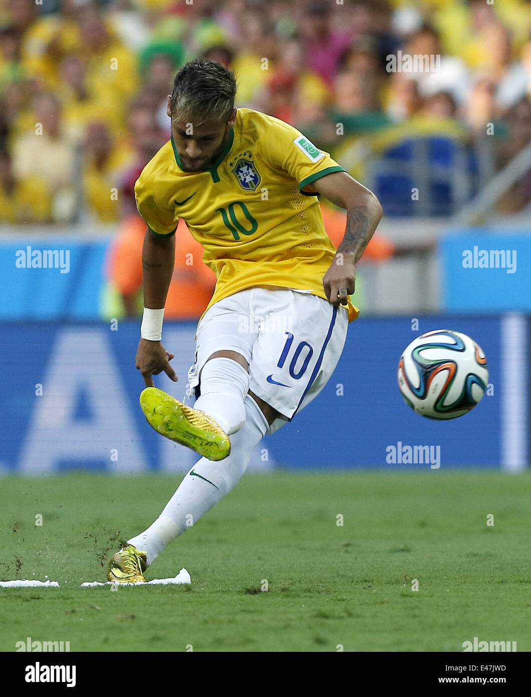 Fortaleza, Brazil. 4th July, 2014. Brazil's Neymar shoots a free kick during a quarter-finals ...
