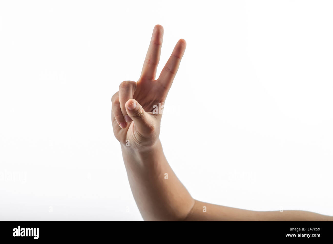 Young hands makes a gesture: victory sign with two fingers Stock Photo ...