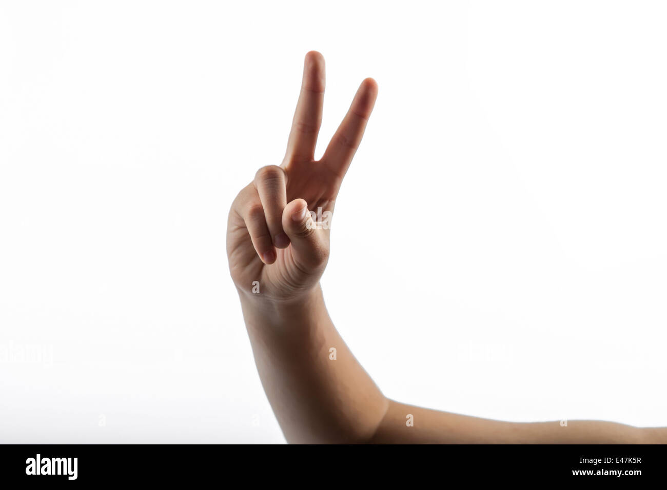 Young hands makes a gesture: victory sign with two fingers Stock Photo ...