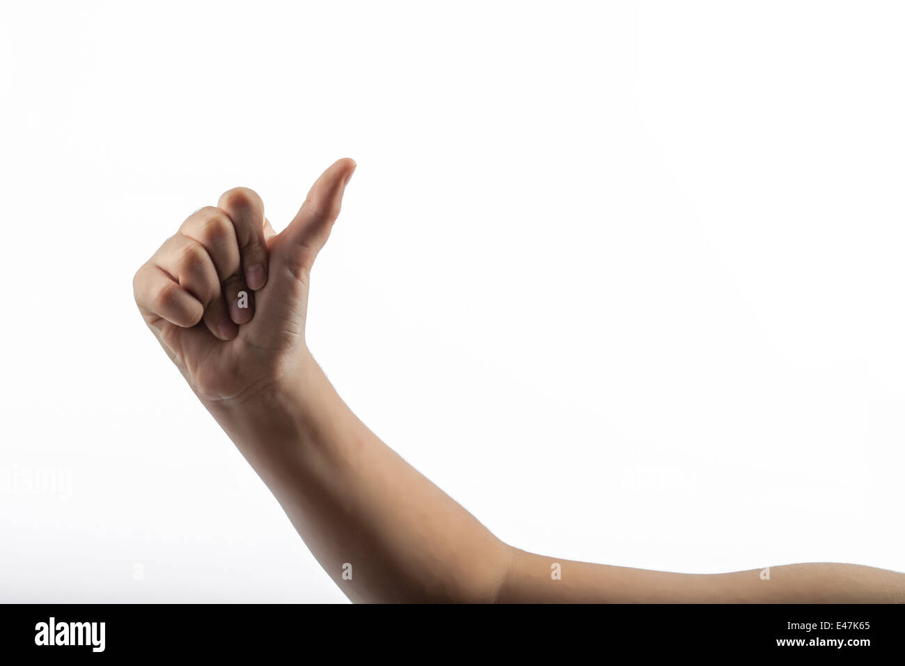 Young hands makes a gesture: hitchhiking sign Stock Photo - Alamy