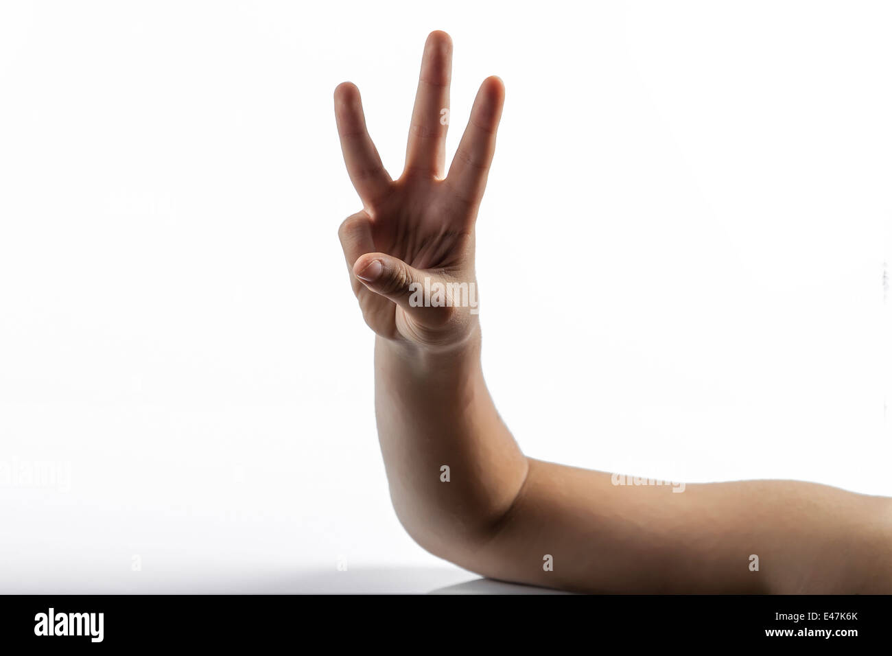 Young hands makes a gesture: number three sign with 3 fingers Stock ...