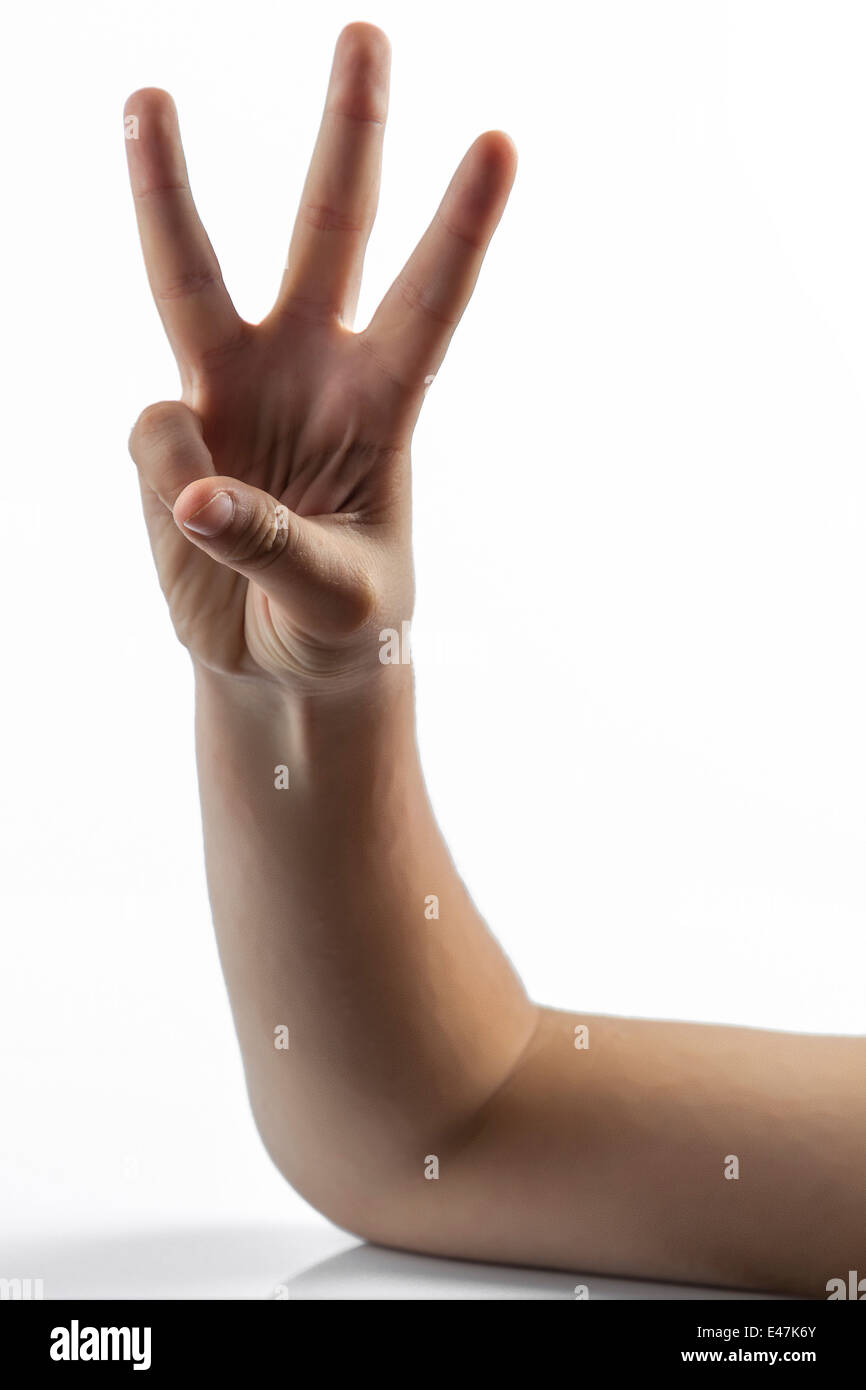 Young hands makes a gesture: number three sign with 3 fingers Stock ...