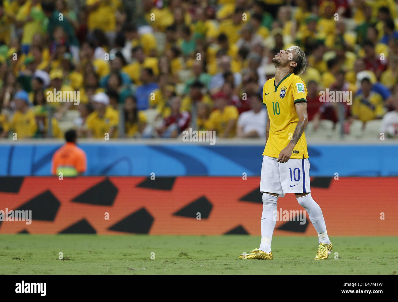 Fortaleza, Brazil. 4th July, 2014. Brazil's Neymar reacts during a quarter-finals match between ...