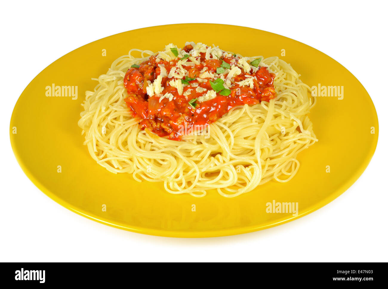 Spaghetti bolognese served in a big yellow plate isolated on white ...