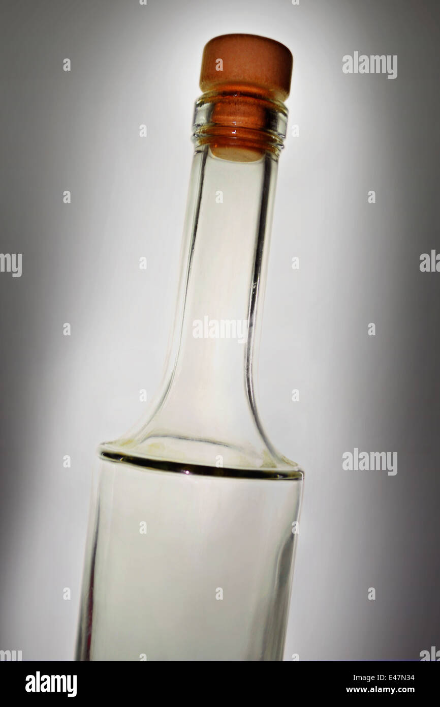 Empty bottle on gray gradient background Stock Photo - Alamy
