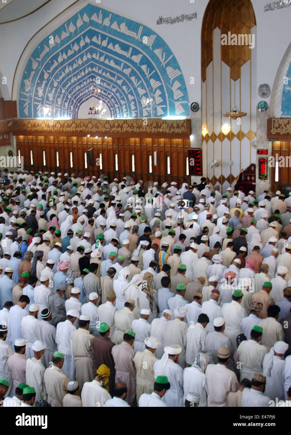 Lahore, Pakistan. 4th July, 2014. Pakistani Muslims offer Friday prayer ...