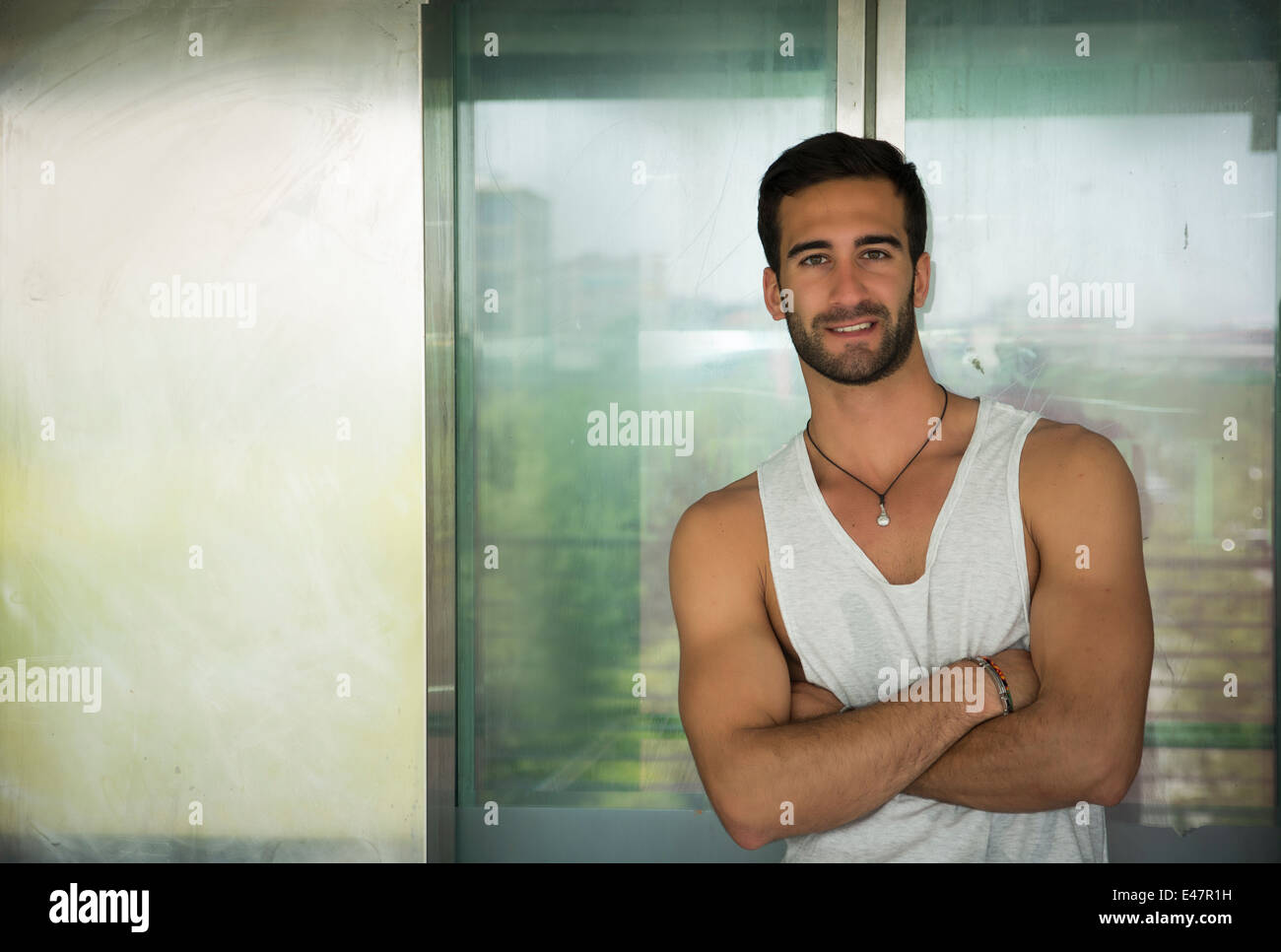 Portrait man smiling tank hi-res stock photography and images - Alamy