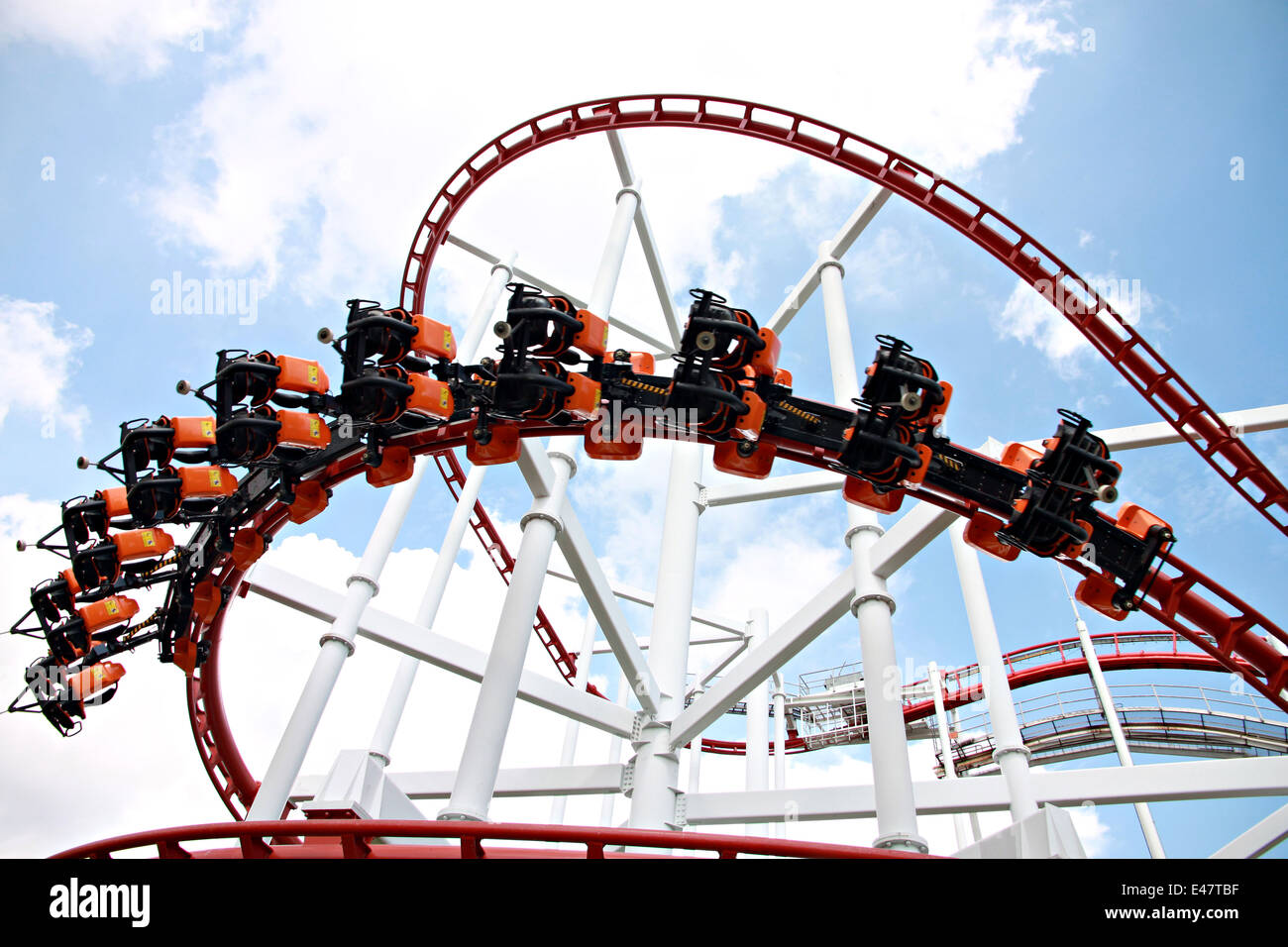 Rollercoaster against blue sky in amusement park Stock Photo - Alamy