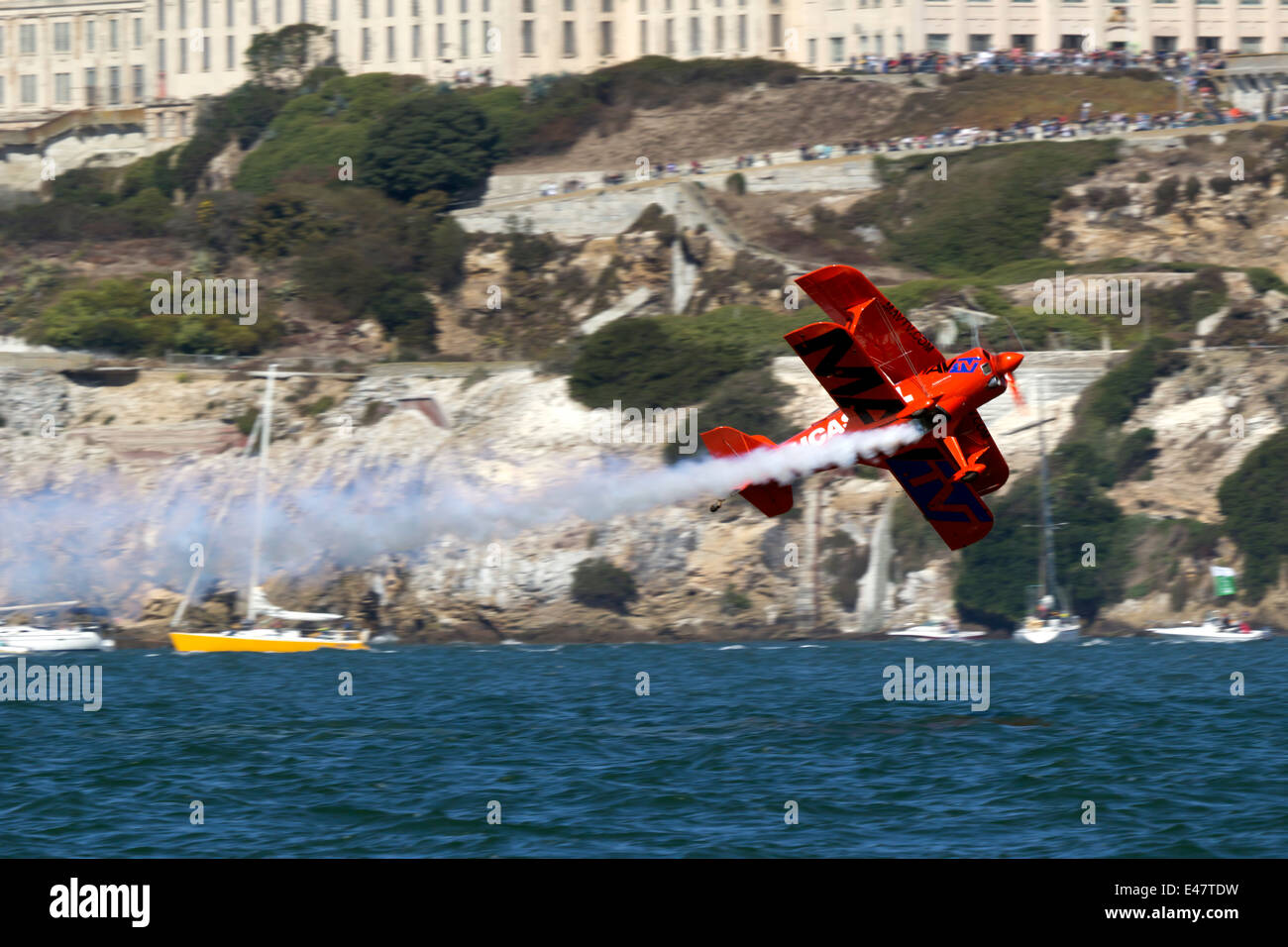 Michael Wiskus pilots the Lucas Oil Air Shows Pitts S1-11B biplane low ...