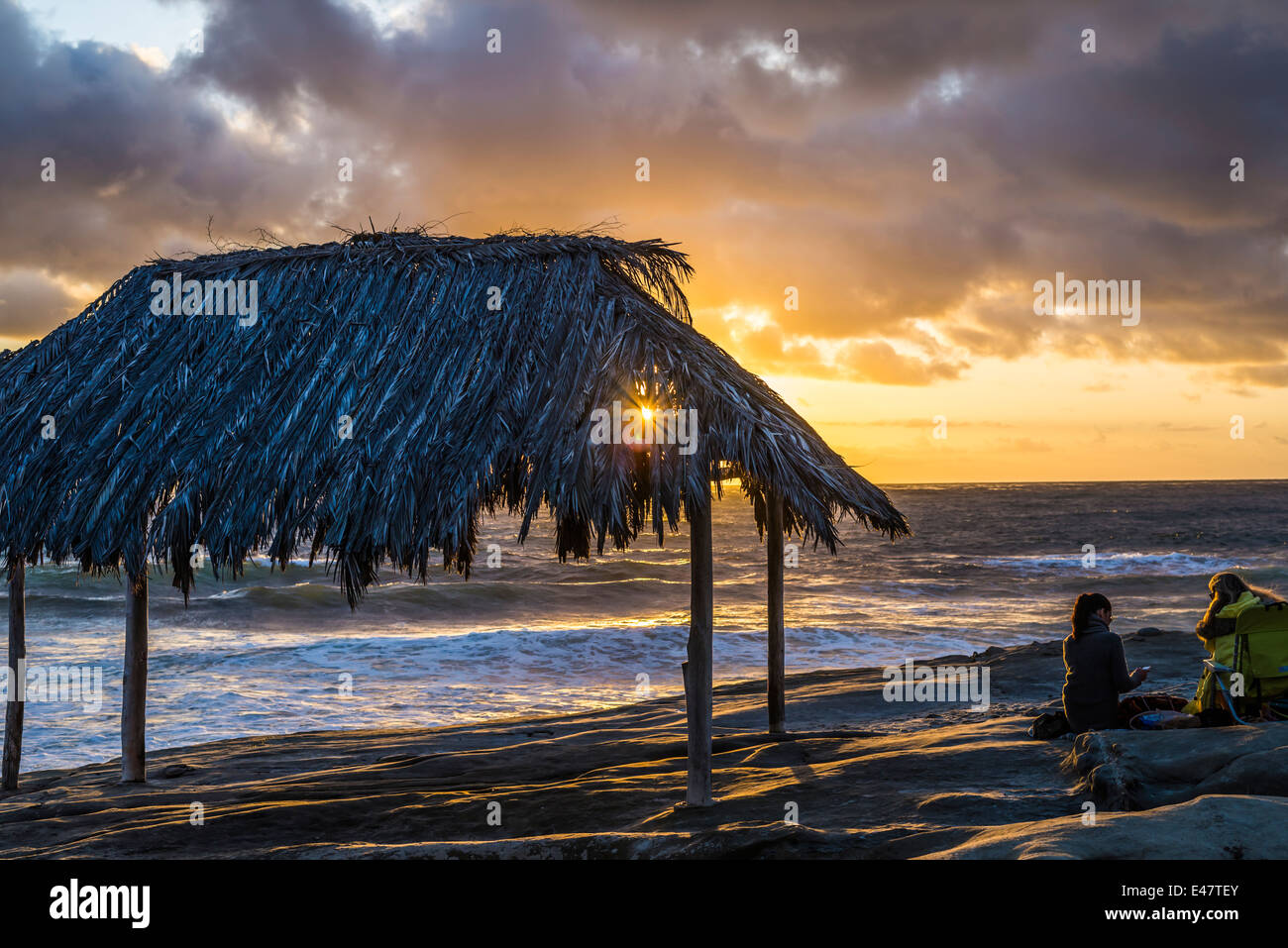 The setting Sun producing a sunstar through the Surf Shack. Windansea ...