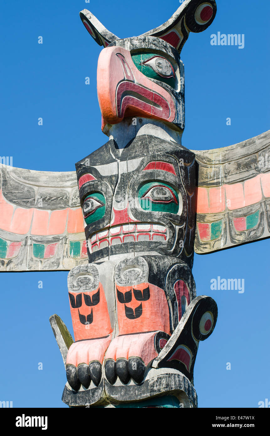 First Nation native totem story monument pole eagle in cemetery in Alert Bay, Cormorant Island ...