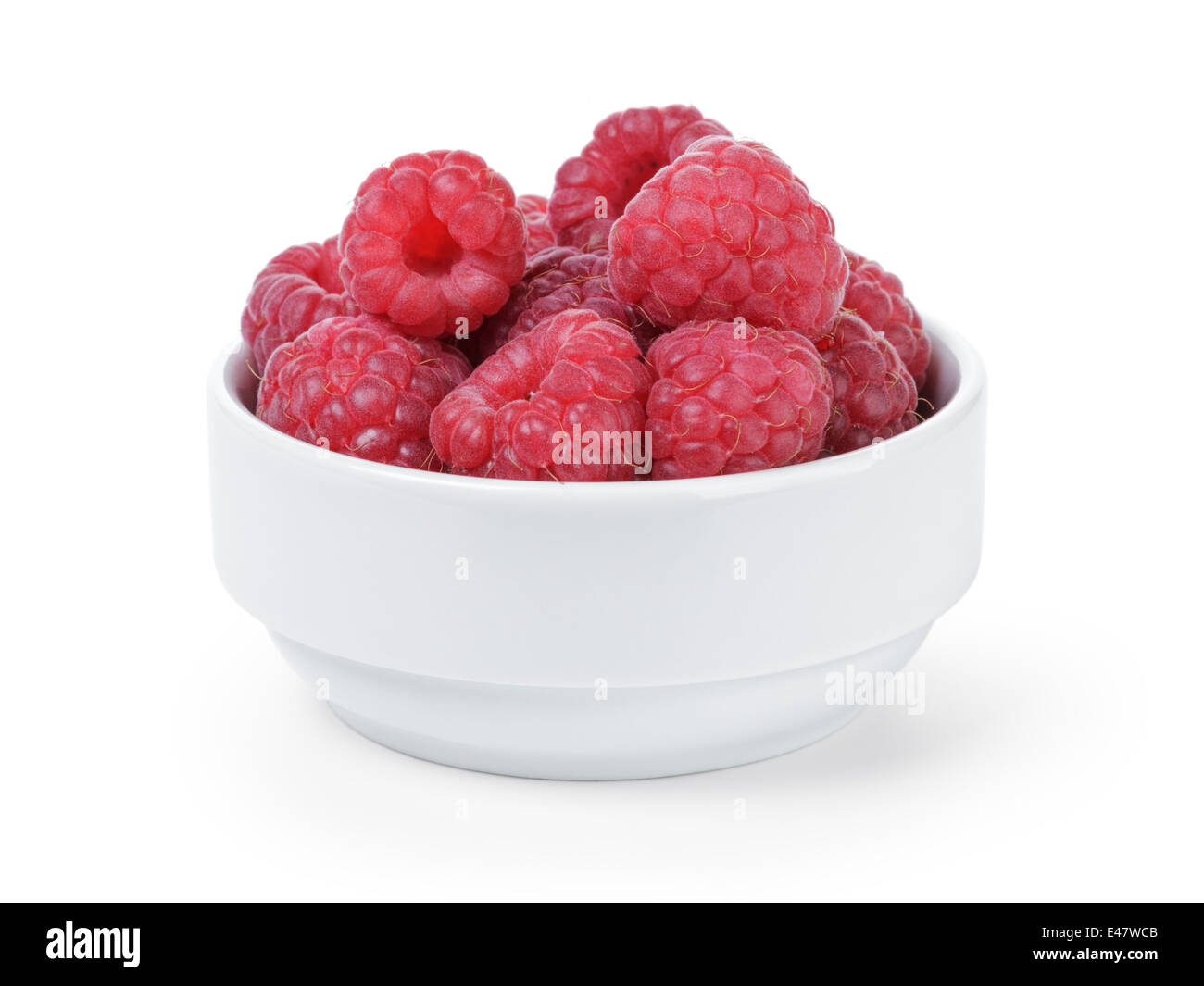 ripe raspberries in bowl, isolated on white background Stock Photo - Alamy