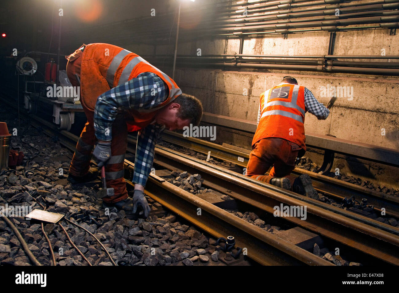 Track builders in metro tunnel Stock Photo - Alamy