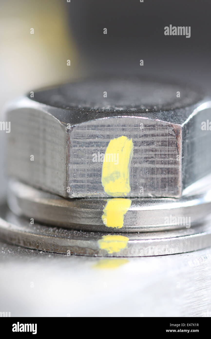 Mark of emblem on head nut stainless for security check Stock Photo - Alamy