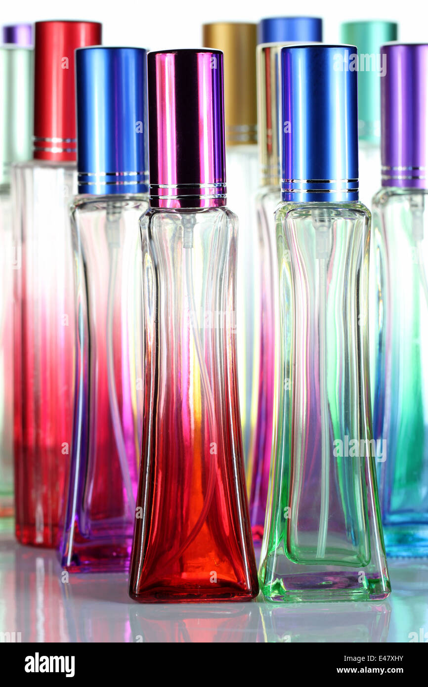 Colorful of perfume bottles for beauty background Stock Photo - Alamy