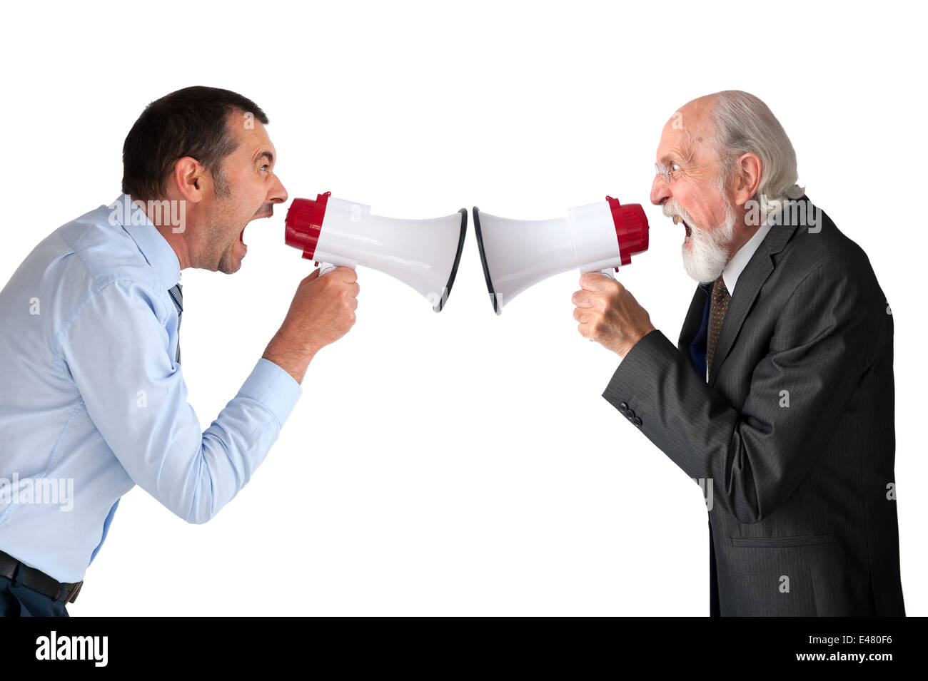 business conflict concept - businessman and senior male manager with ...