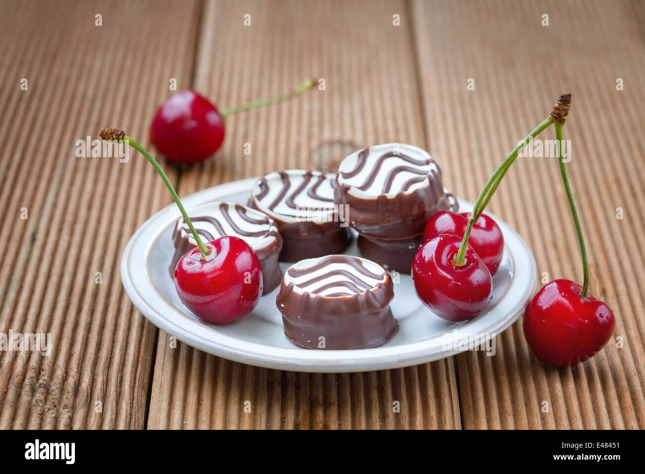 Swiss cookies with ripe cherries Stock Photo - Alamy