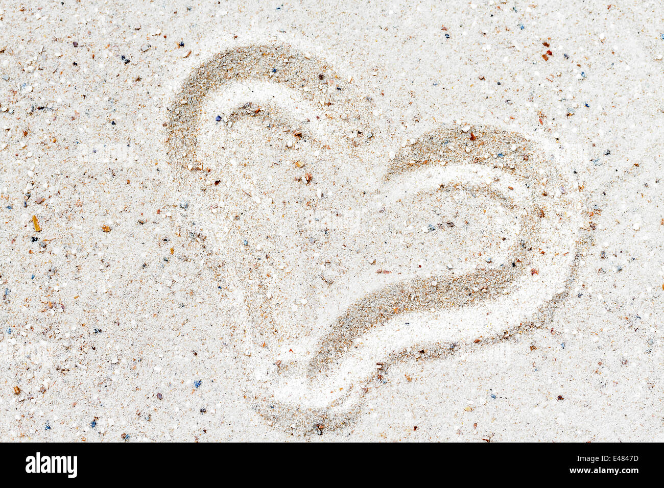 Heart drawn in the sand Stock Photo - Alamy
