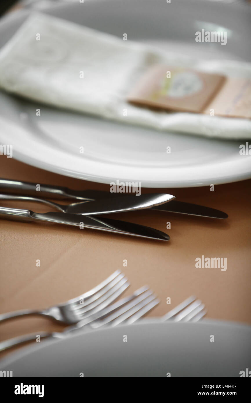 Shot with a dinner table in a restaurant Stock Photo - Alamy