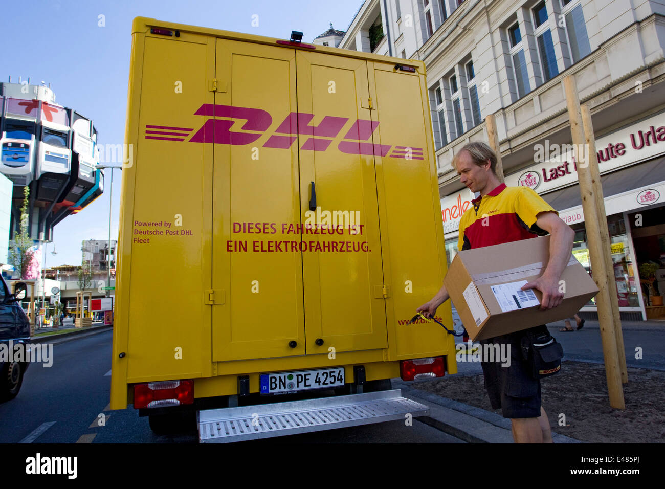 DHL electrical package car Stock Photo - Alamy