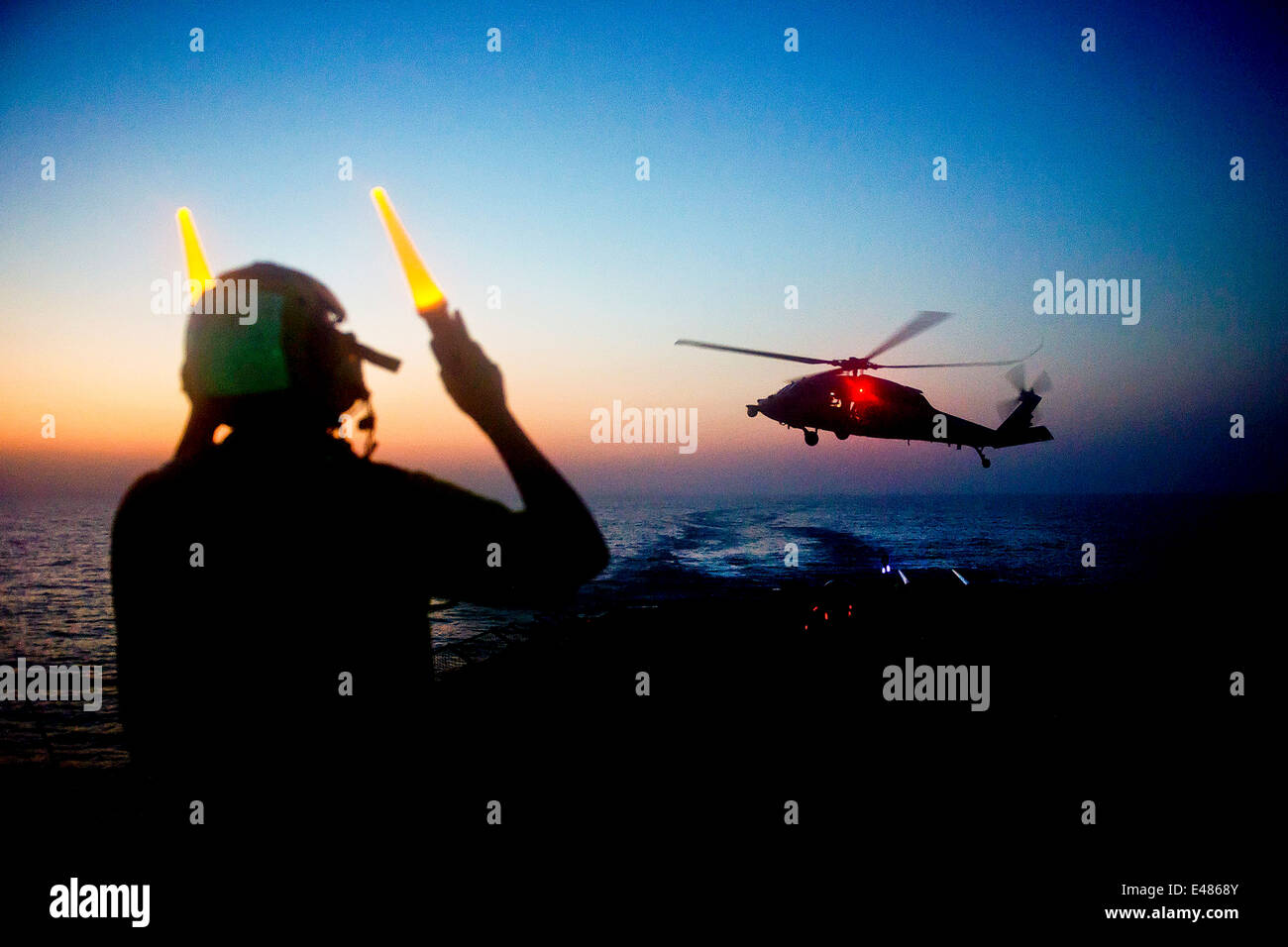 Helicopter lands sailor signals hi-res stock photography and images - Alamy